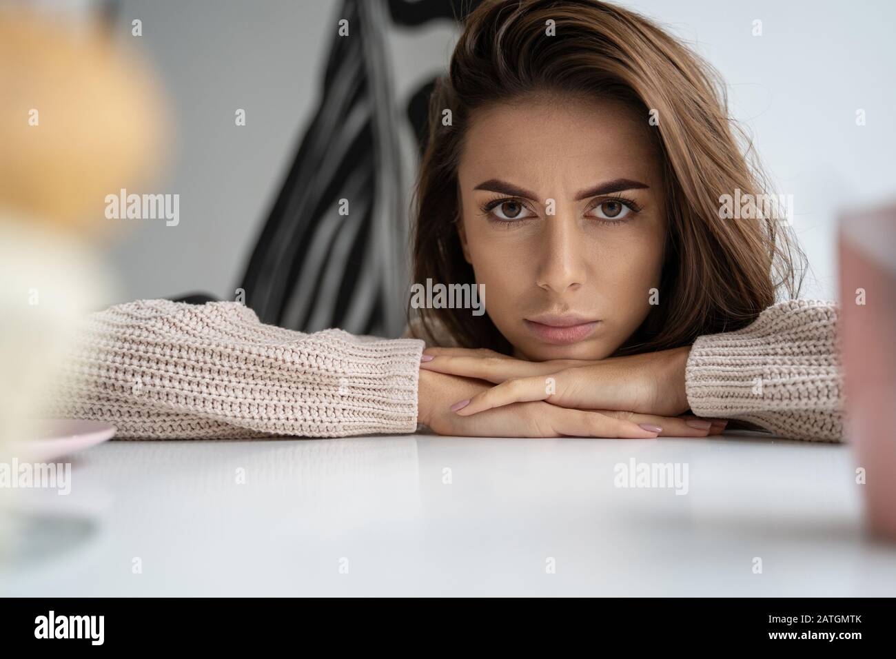 Angry Caucasian girl staring at the camera Stock Photo - Alamy