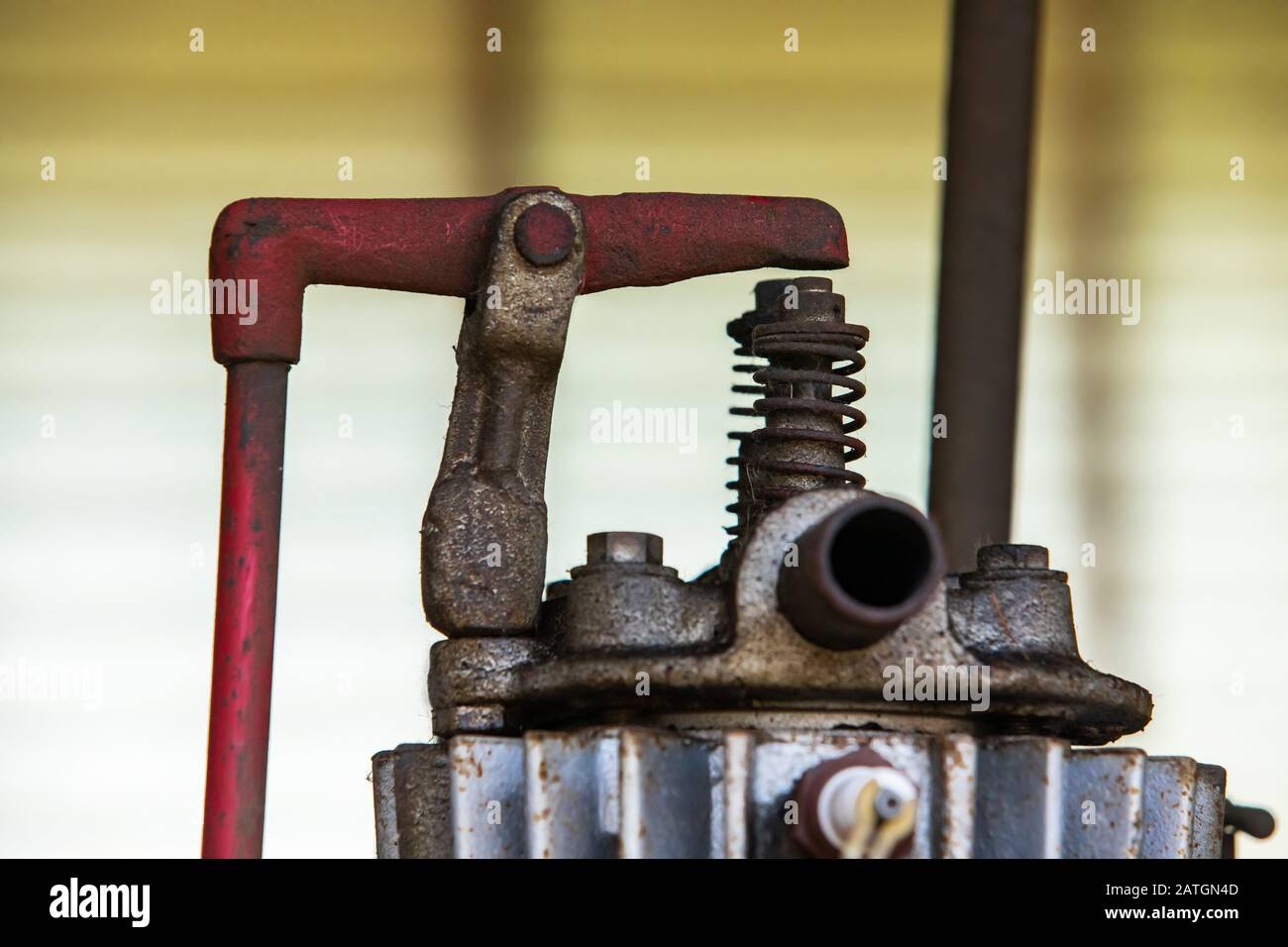 Close-up view of a vintage agricultural engine. Farming machinery part ...