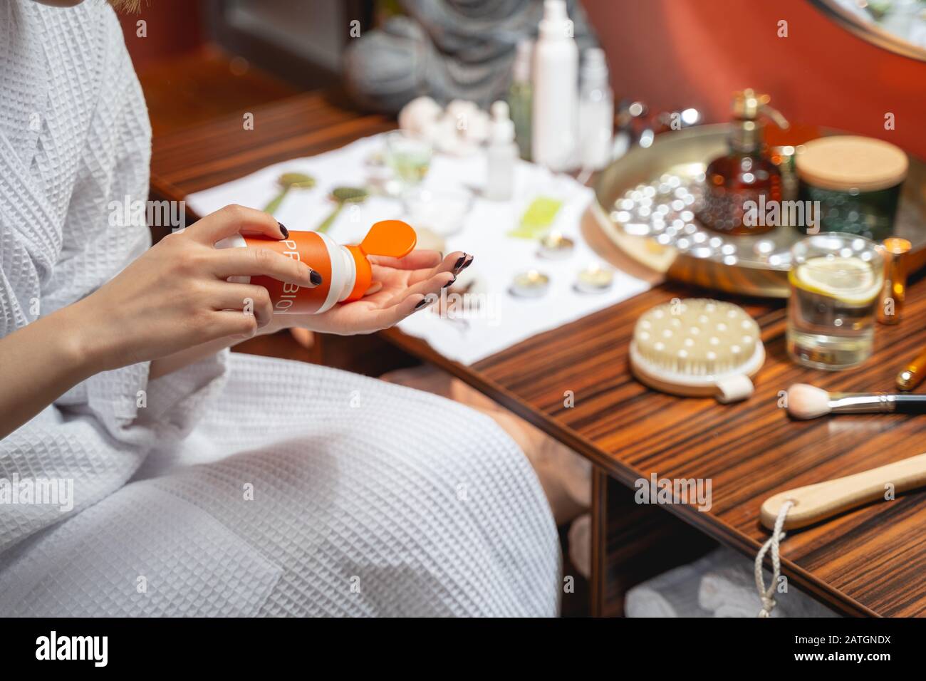 Cropped photo of woman applying hand cream on her hands Stock Photo - Alamy