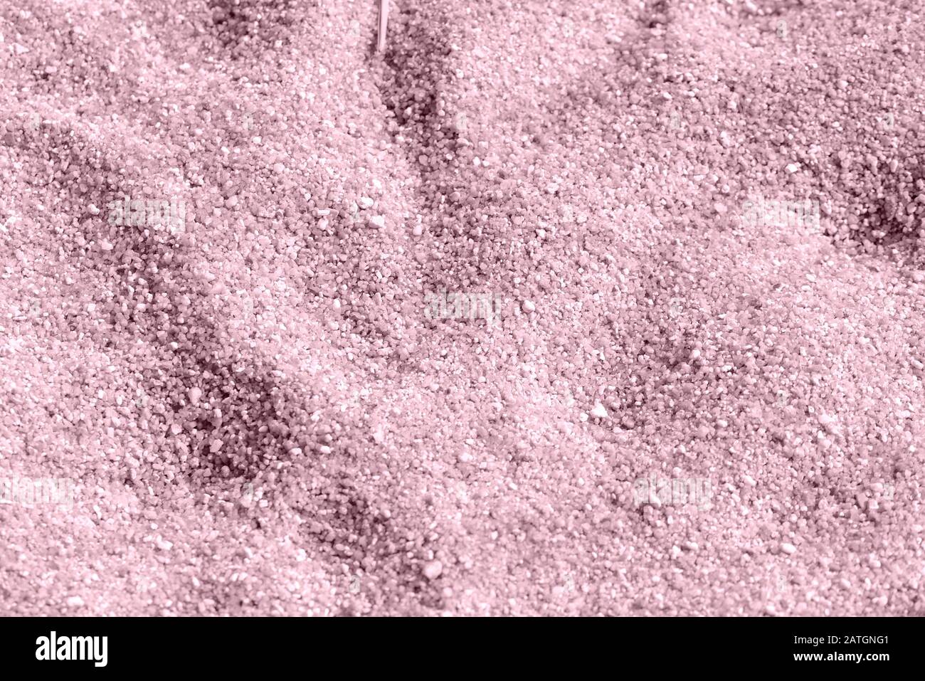 Beach sand texture close-up. Natural background pink color toned Stock ...