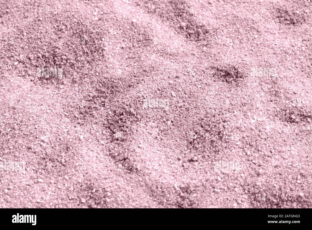 Beach sand texture close-up. Natural background pink color toned Stock ...