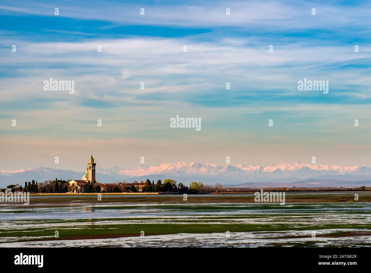 The ancient Sanctuary of Barbana with snowy mountains in the background ...