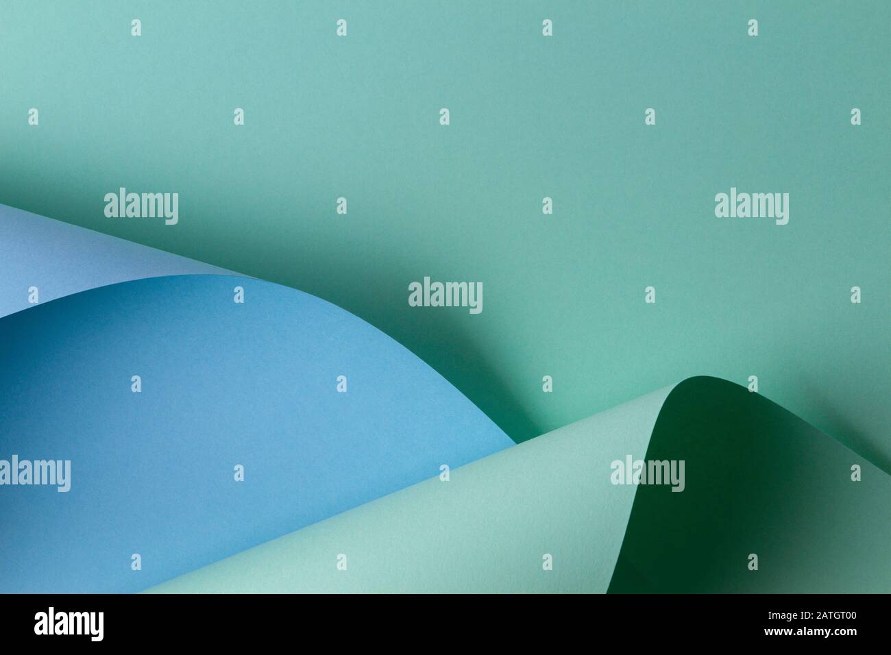 Abstract geometric shape light green and blue color paper background ...