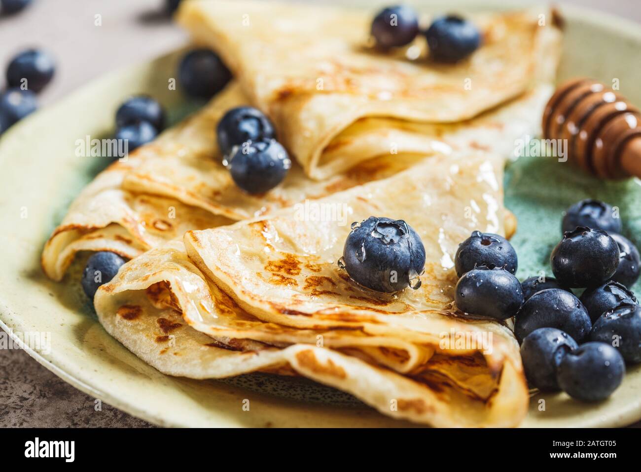 Crepes with blueberry sauce hi-res stock photography and images - Alamy