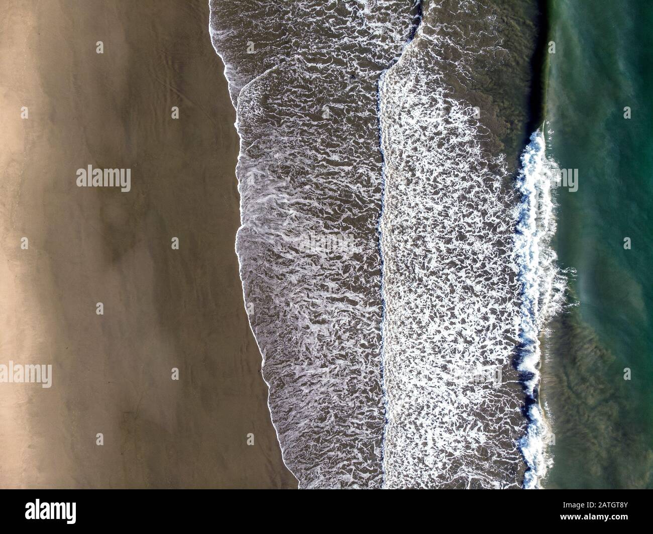 Waves wash up on beach hi-res stock photography and images - Alamy