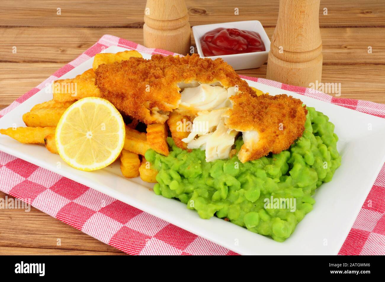Fish and chips meal with mushy peas Stock Photo - Alamy