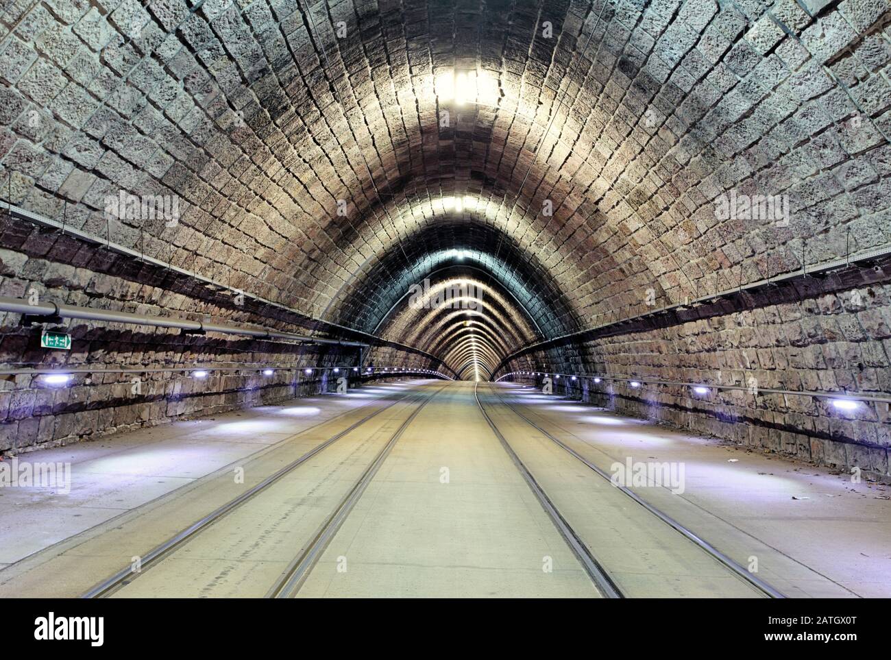 Underground railroad with moving train, transporation Stock Photo - Alamy