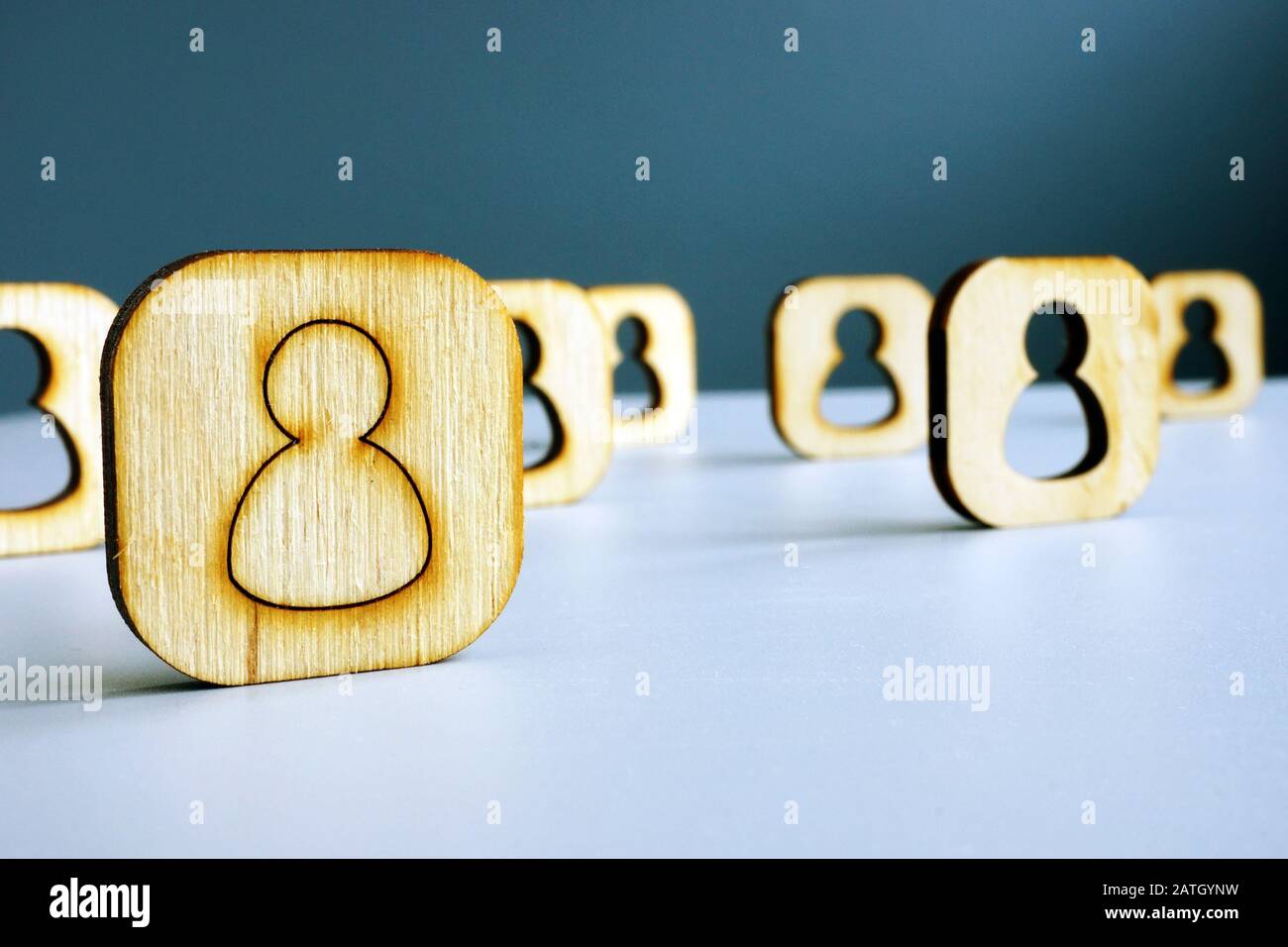 Unique figurine in the crowd as symbol of difference Stock Photo - Alamy