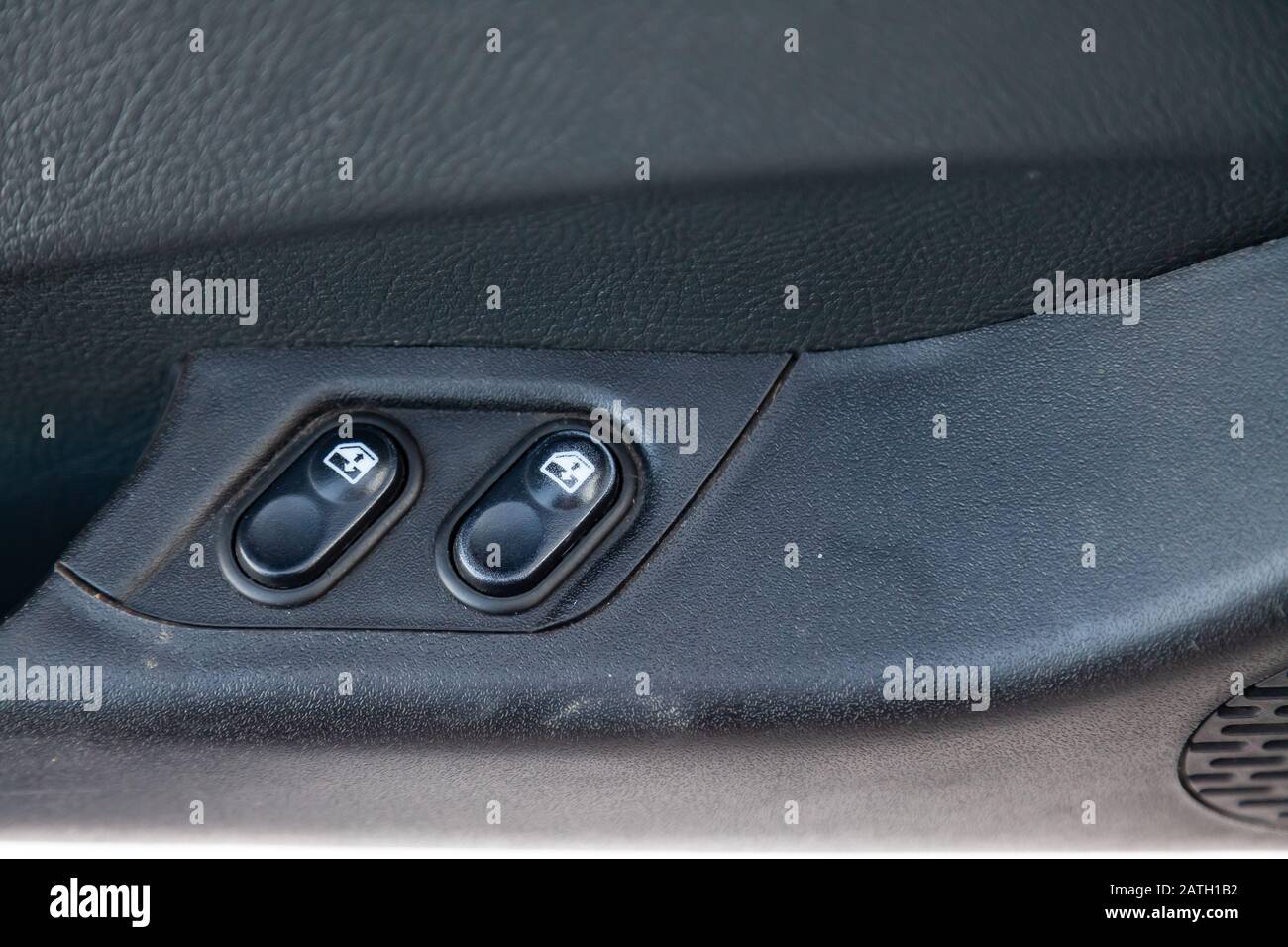 Two old control buttons for automatic opening of car windows and ...