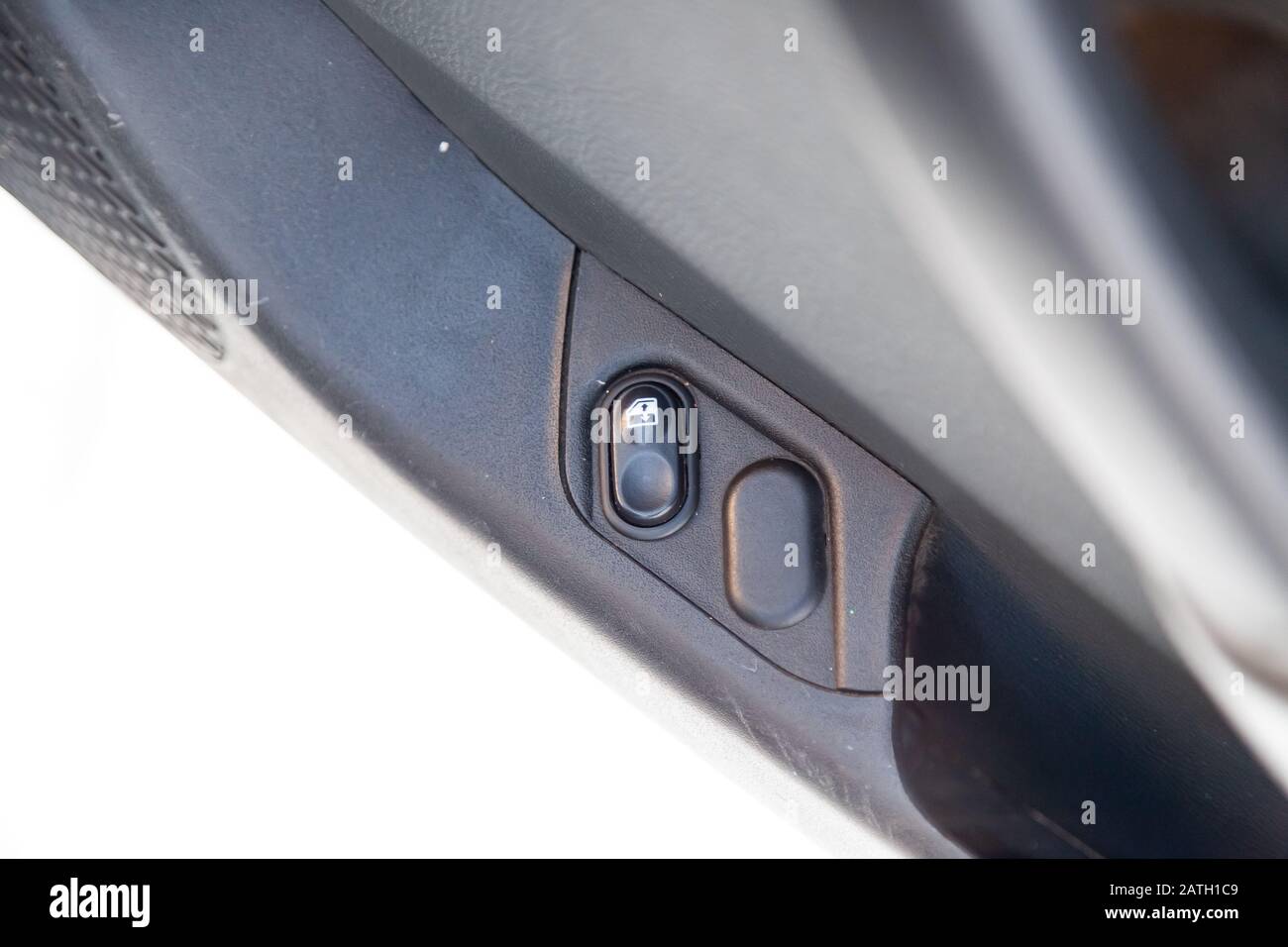 One old control button for automatic opening of car windows and central ...