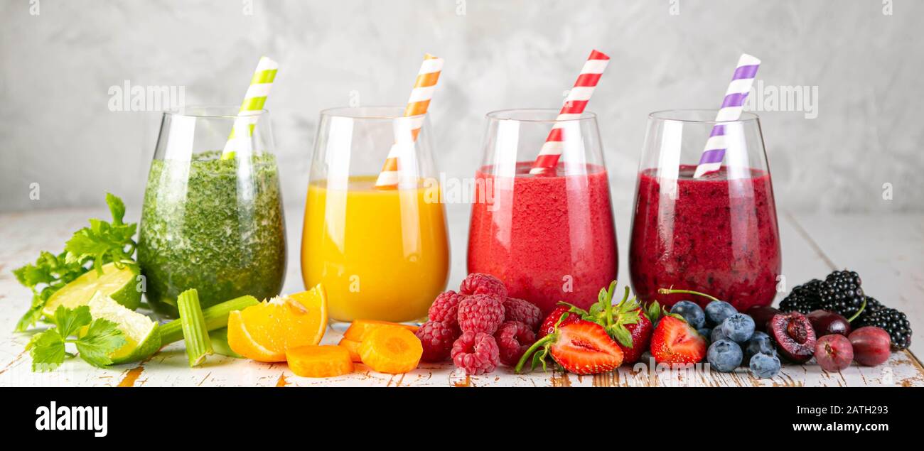 Selection of colorful smoothies in glasses Stock Photo - Alamy