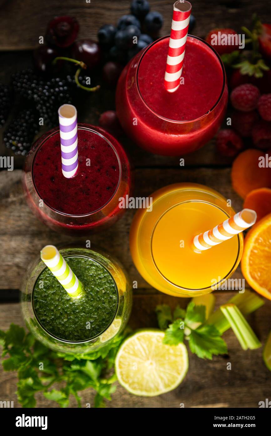 Selection of colorful smoothies in glasses Stock Photo - Alamy