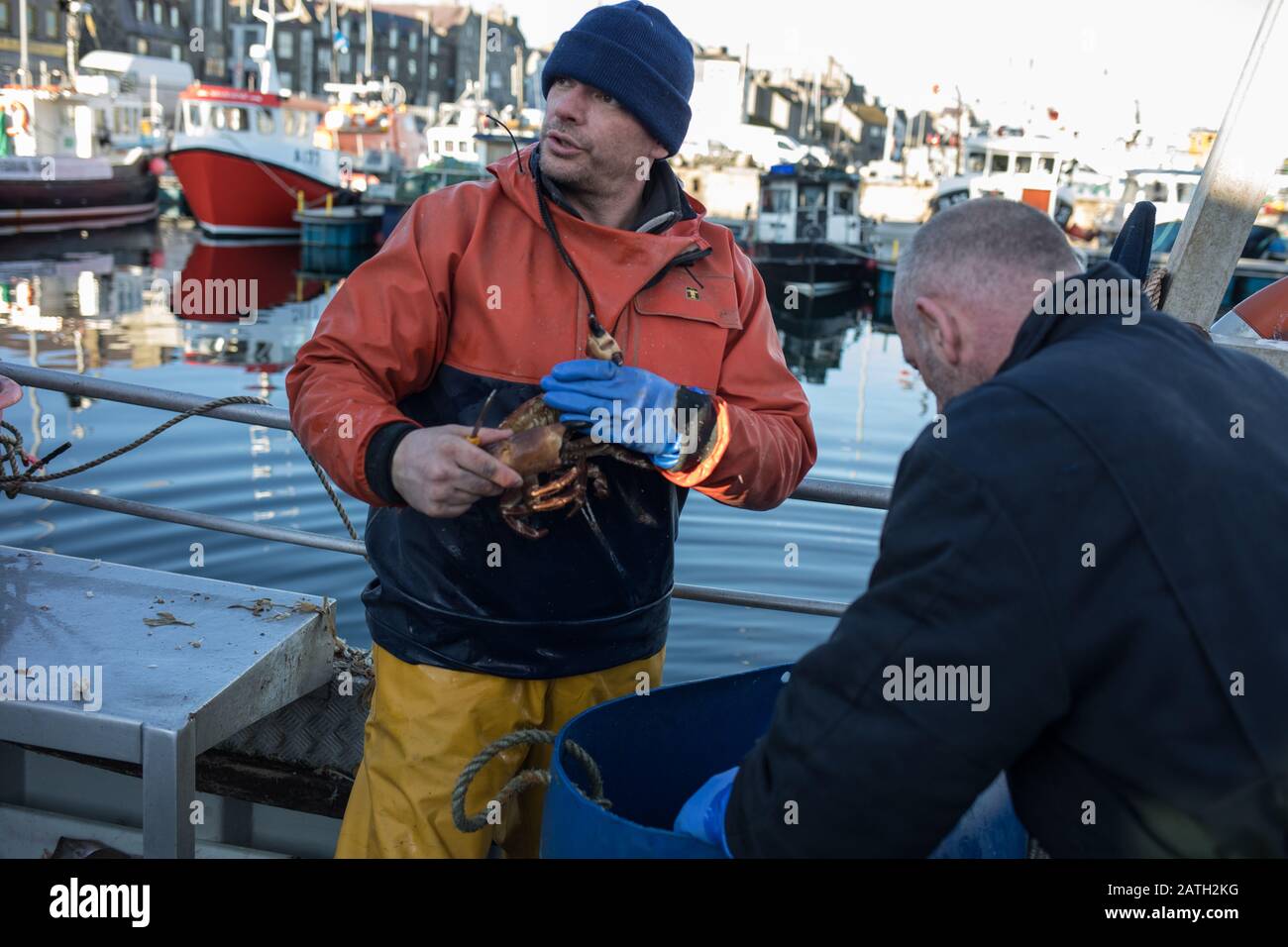 Gary (orange and blue jacket) and his brother Jordan (dark overalls ...