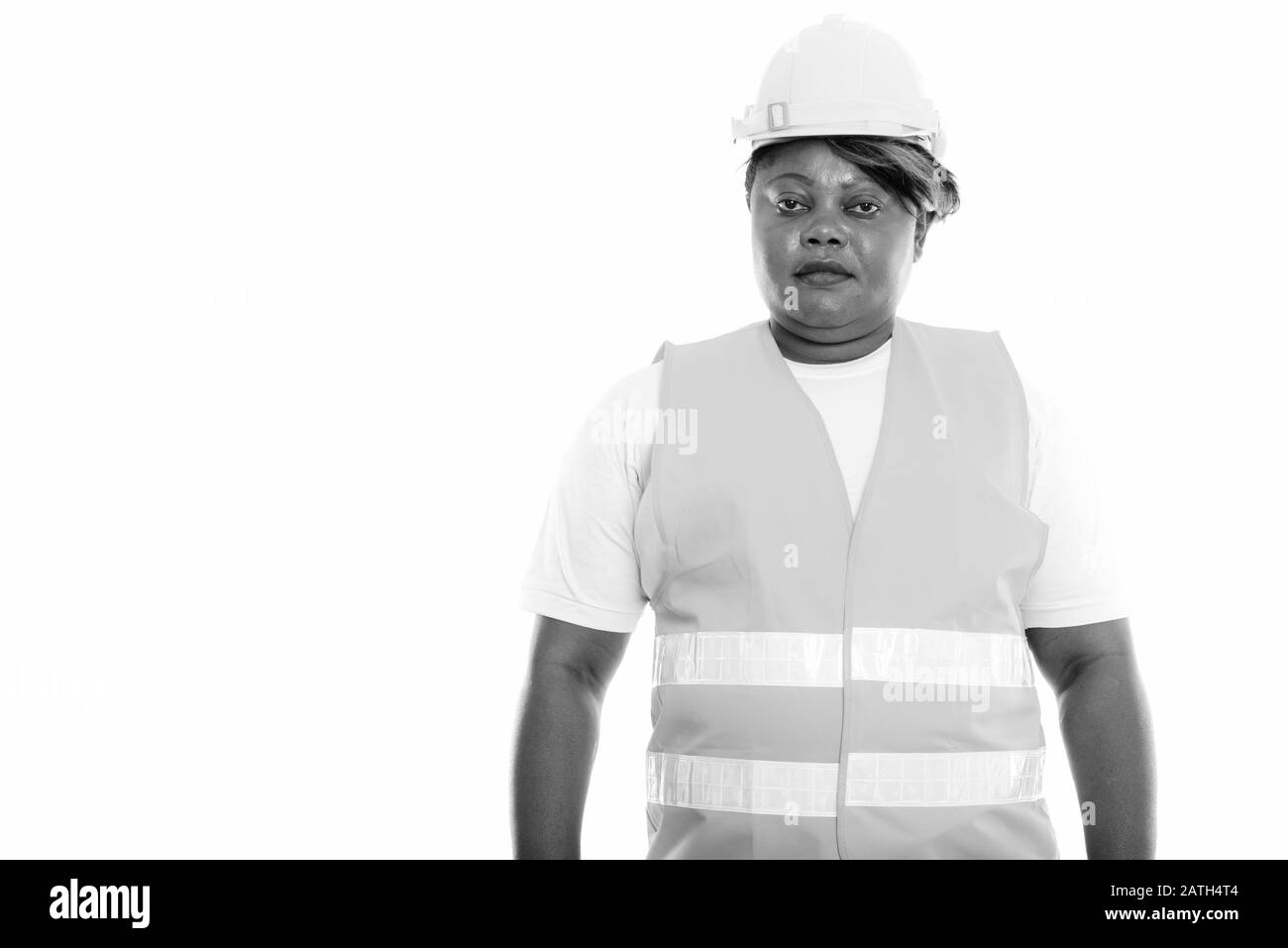 Studio shot of fat black African woman construction worker Stock Photo ...