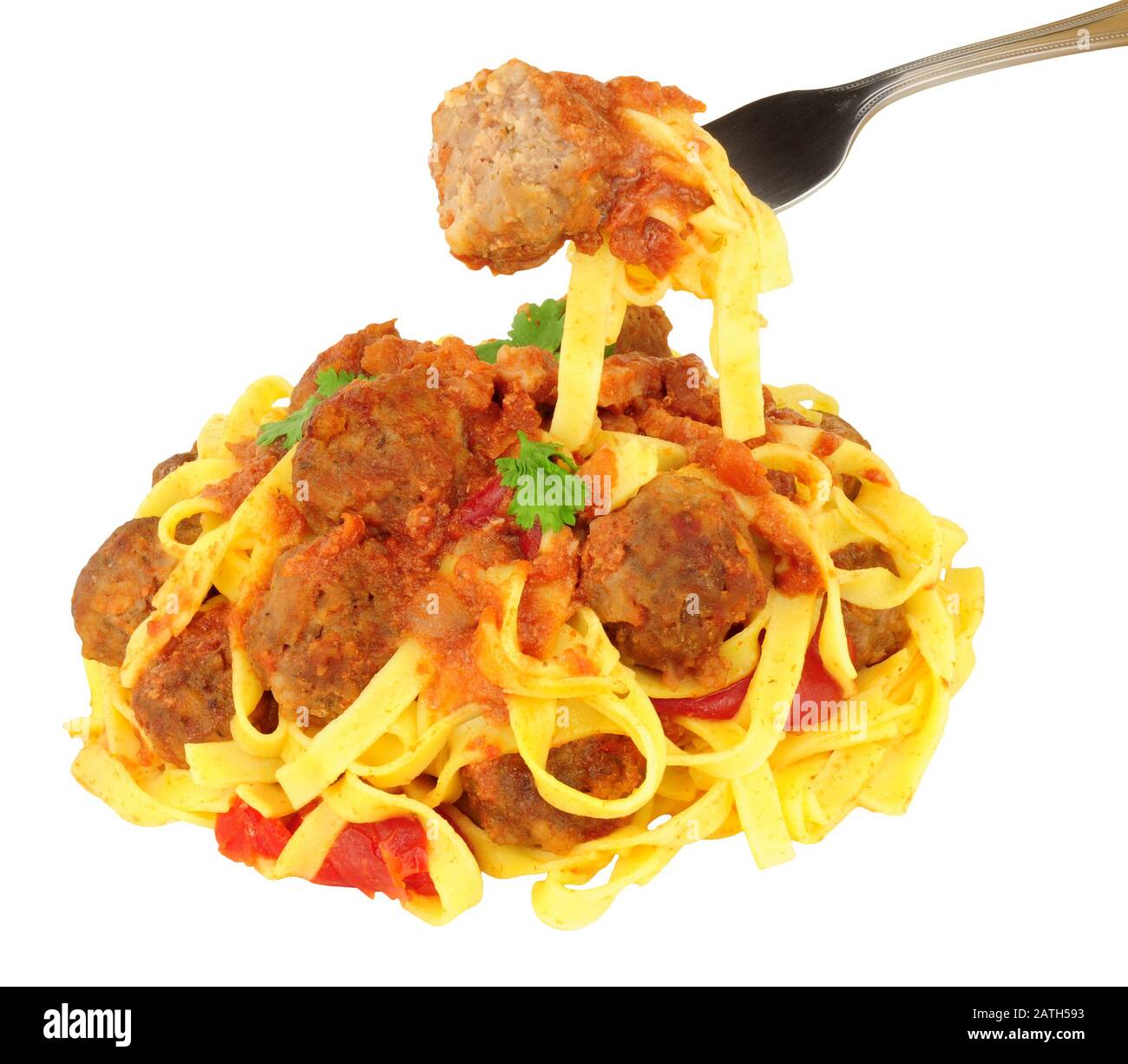 Pork meatballs and tagliatelle pasta meal isolated on a white ...