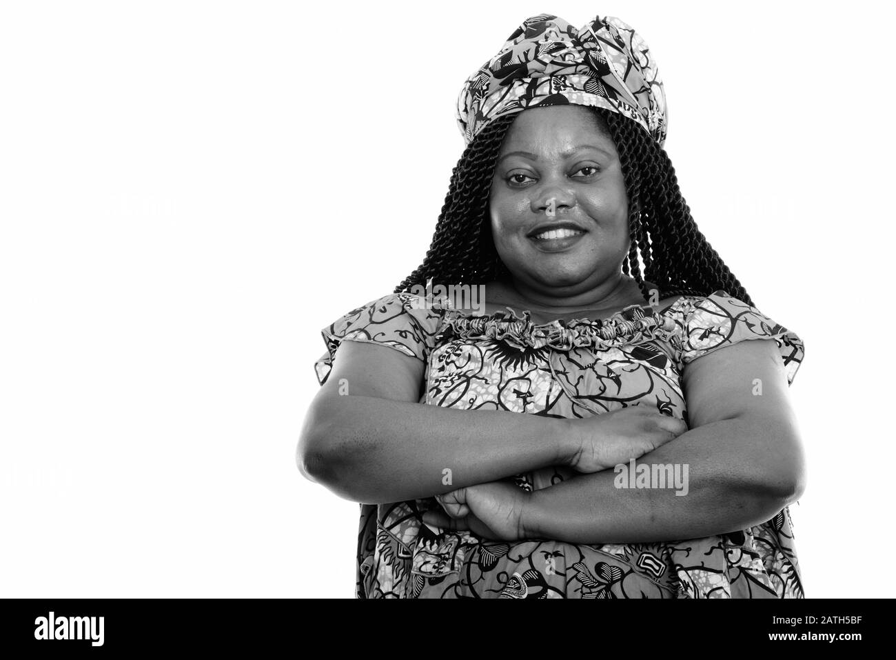 Portrait of beautiful overweight African woman with traditional clothes ...
