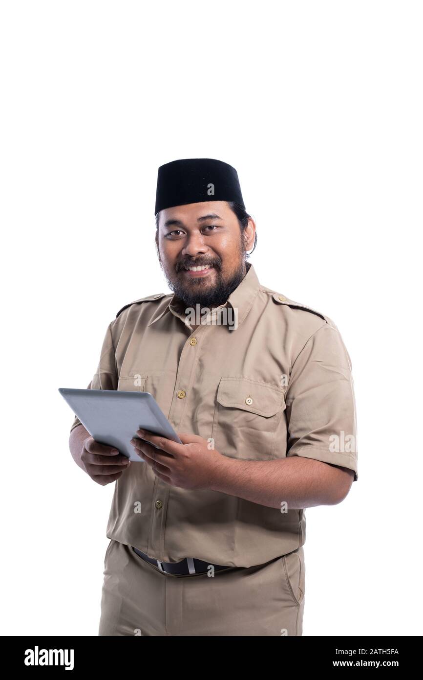 happy indonesian government worker using tabletp pc. businessman using ...