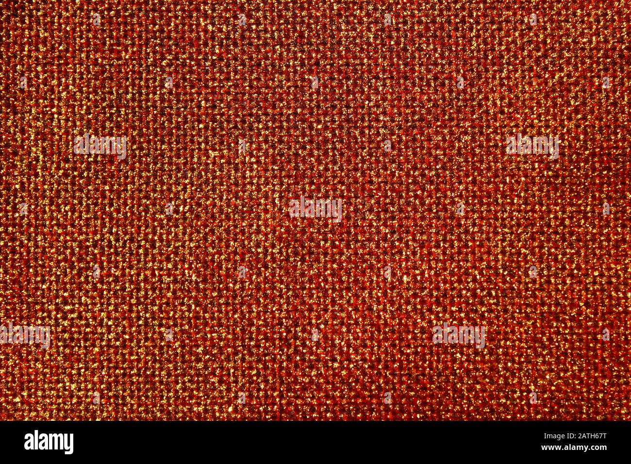 The picture shows red jute with golden glitter Stock Photo - Alamy