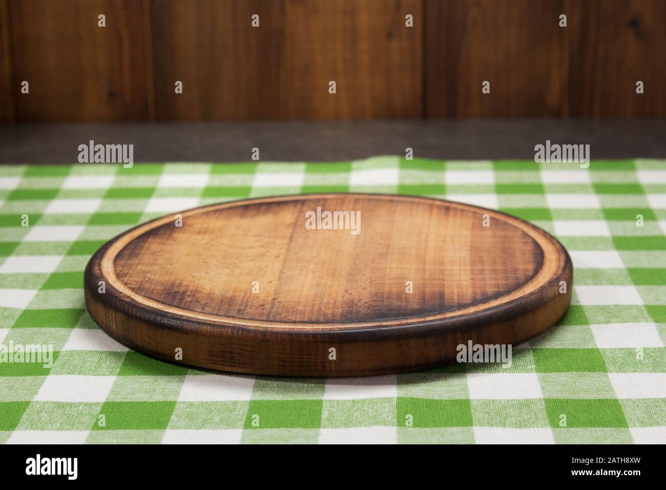 pizza cutting board at rustic wooden table plank background, front view ...