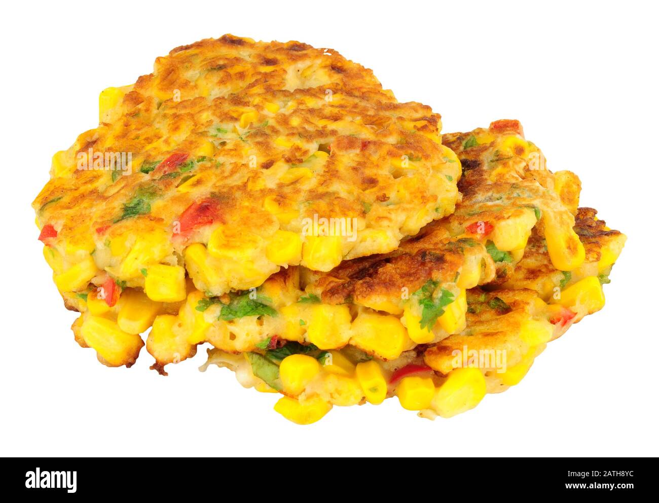 Fried sweetcorn and chilli pepper fritters isolated on a white ...