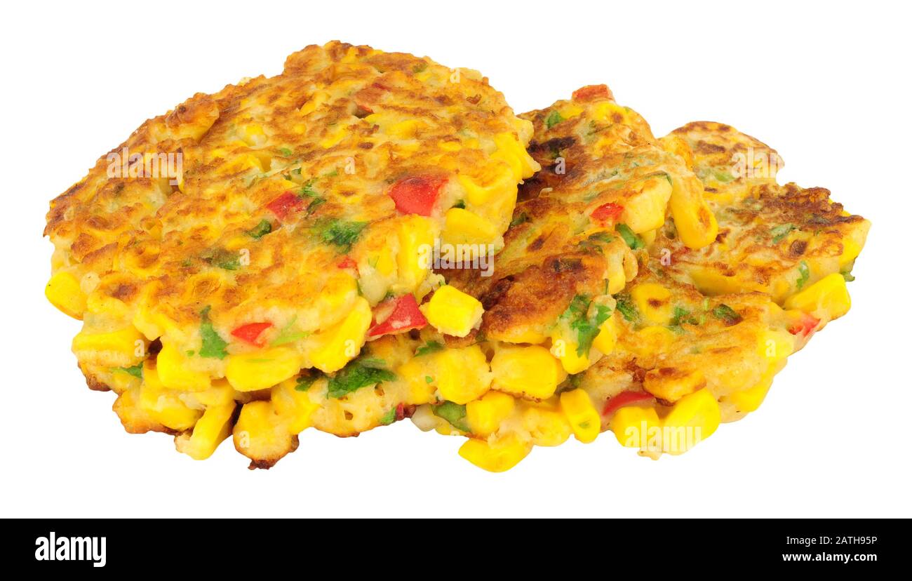 Fried sweetcorn and chilli pepper fritters isolated on a white ...