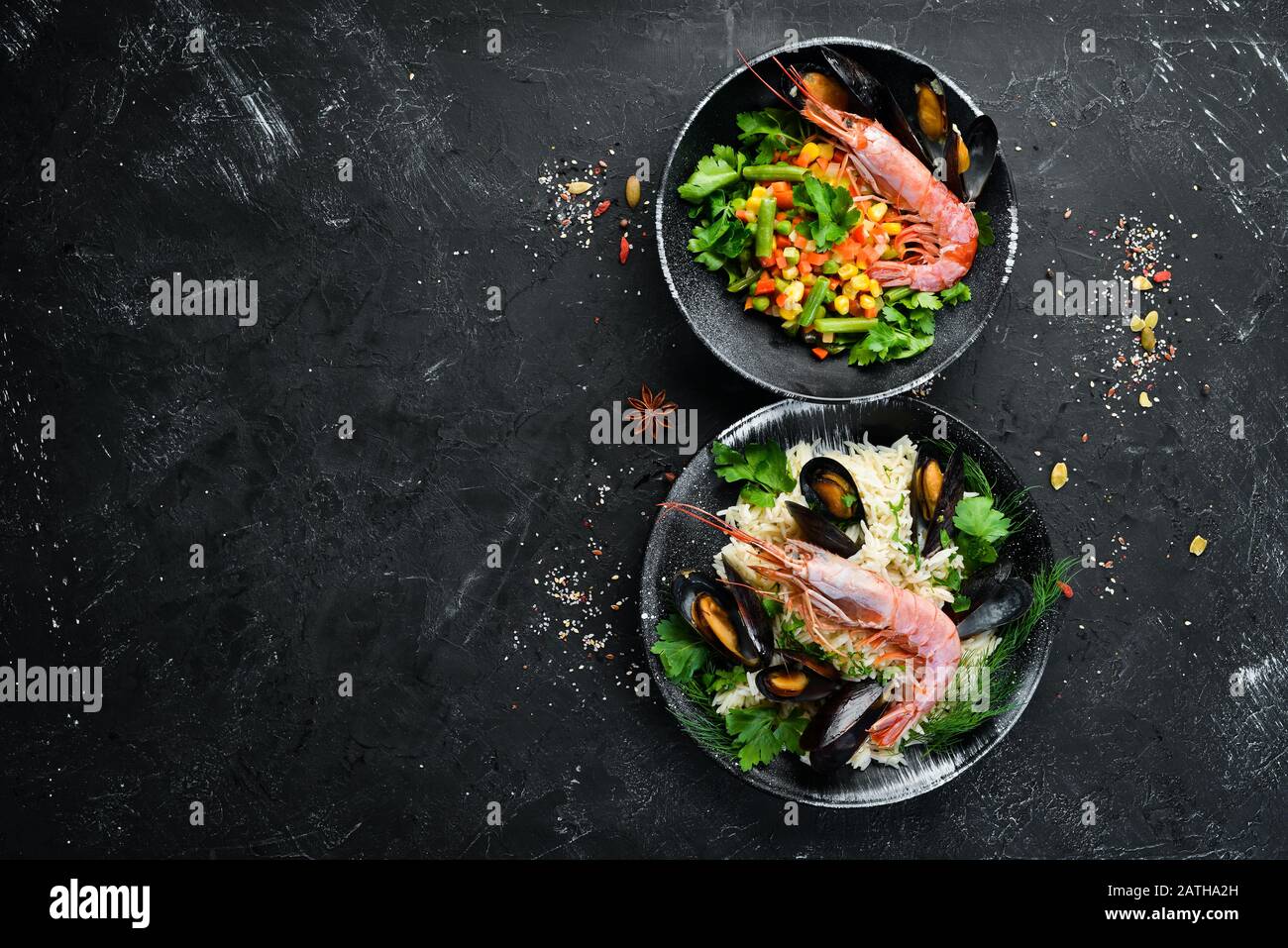 Rice and seafood. Top view. Free copy space Stock Photo - Alamy