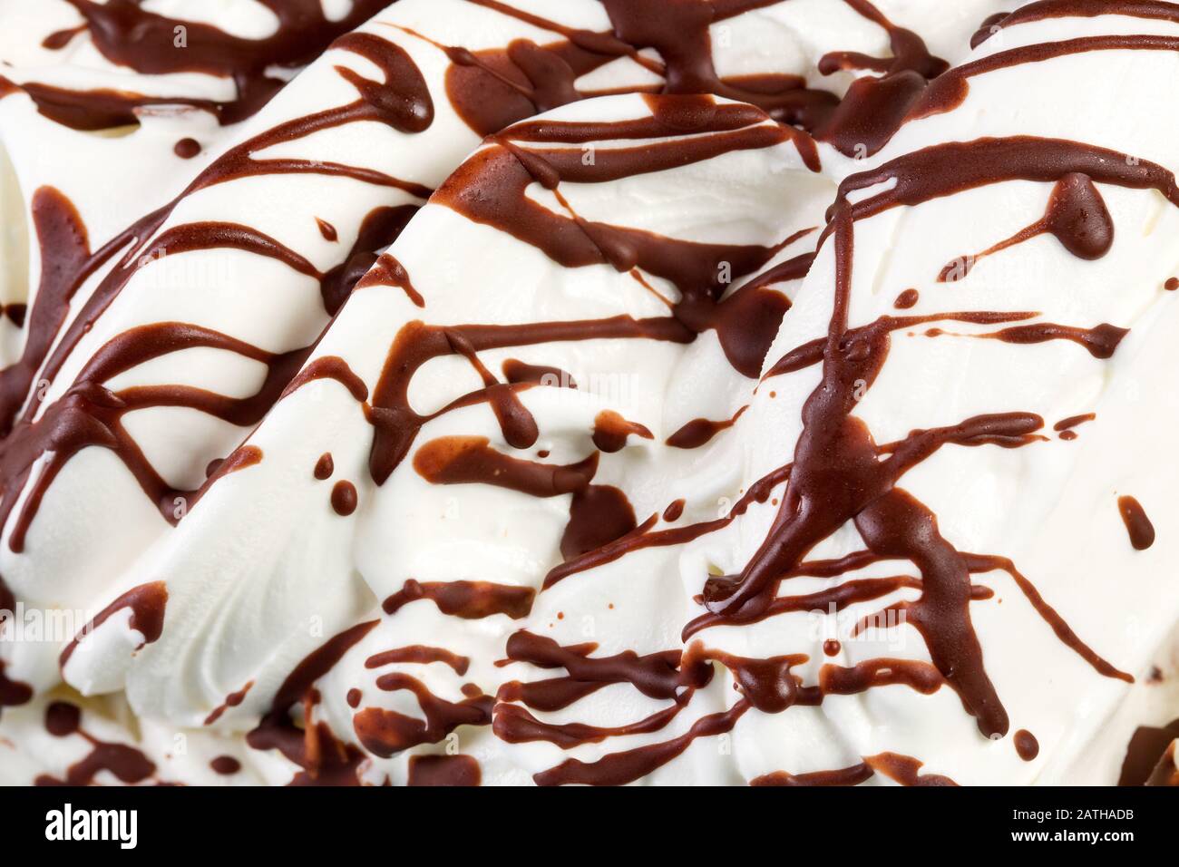 Mass of ice-cream with chocolate syrup. Food background Stock Photo - Alamy