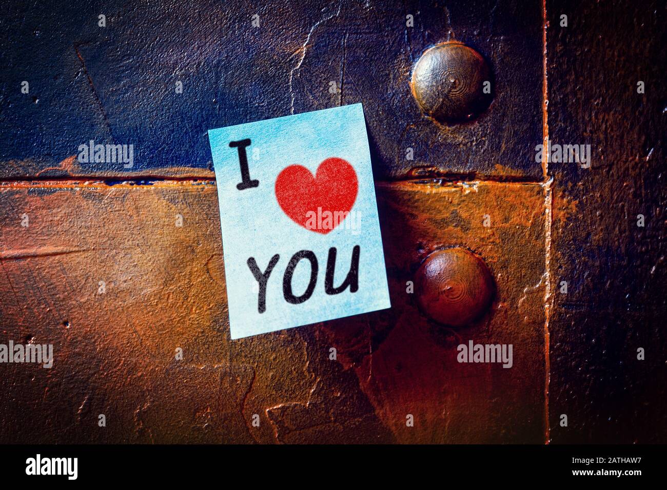 Notepad on a metallic pinboard, Text i love you with a heart, concept ...