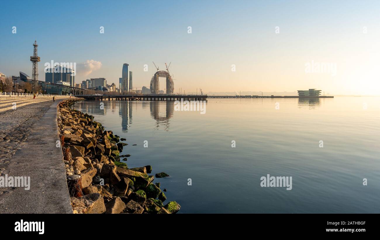 Caspian Sea coast in Baku during sunrise, new construction Stock Photo ...