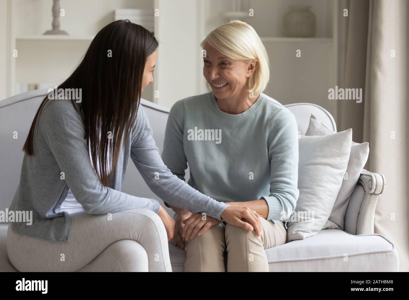 Child and adult talking hi-res stock photography and images - Alamy