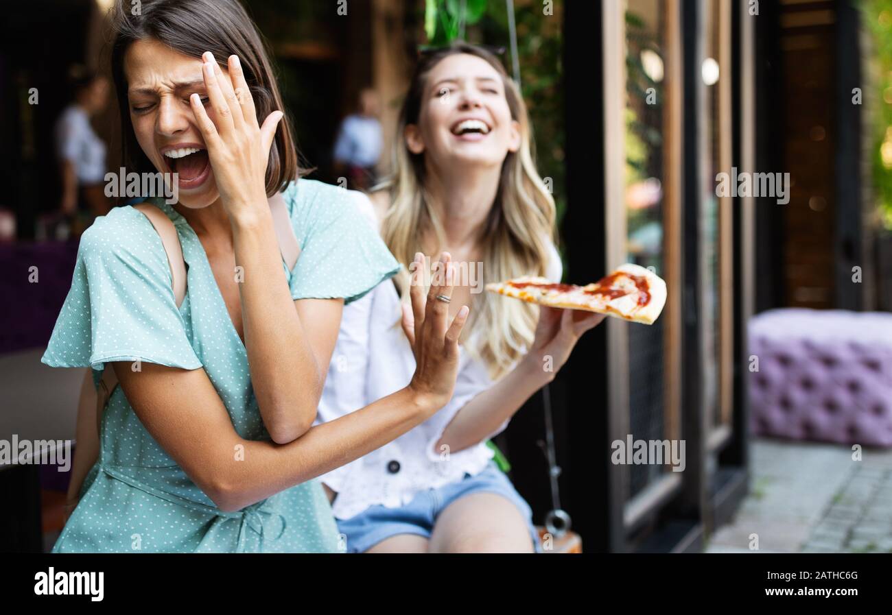 Woman rejecting unhealthy fast food because of gluten intolerance Stock ...
