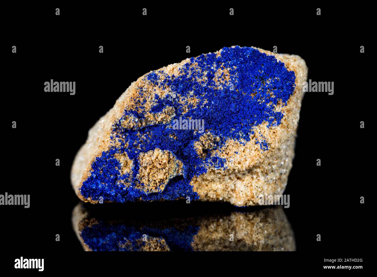 Raw azurite mineral stone in front of black background, mineralogy and ...