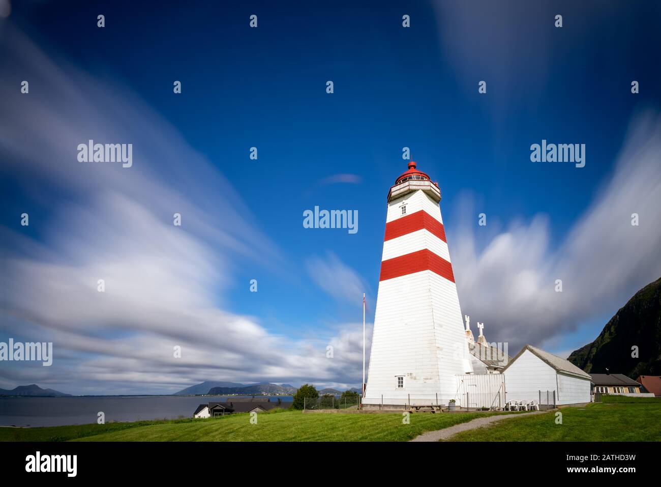 The lighthouse of Alnes, Godøy island, on the west coast of Norway ...