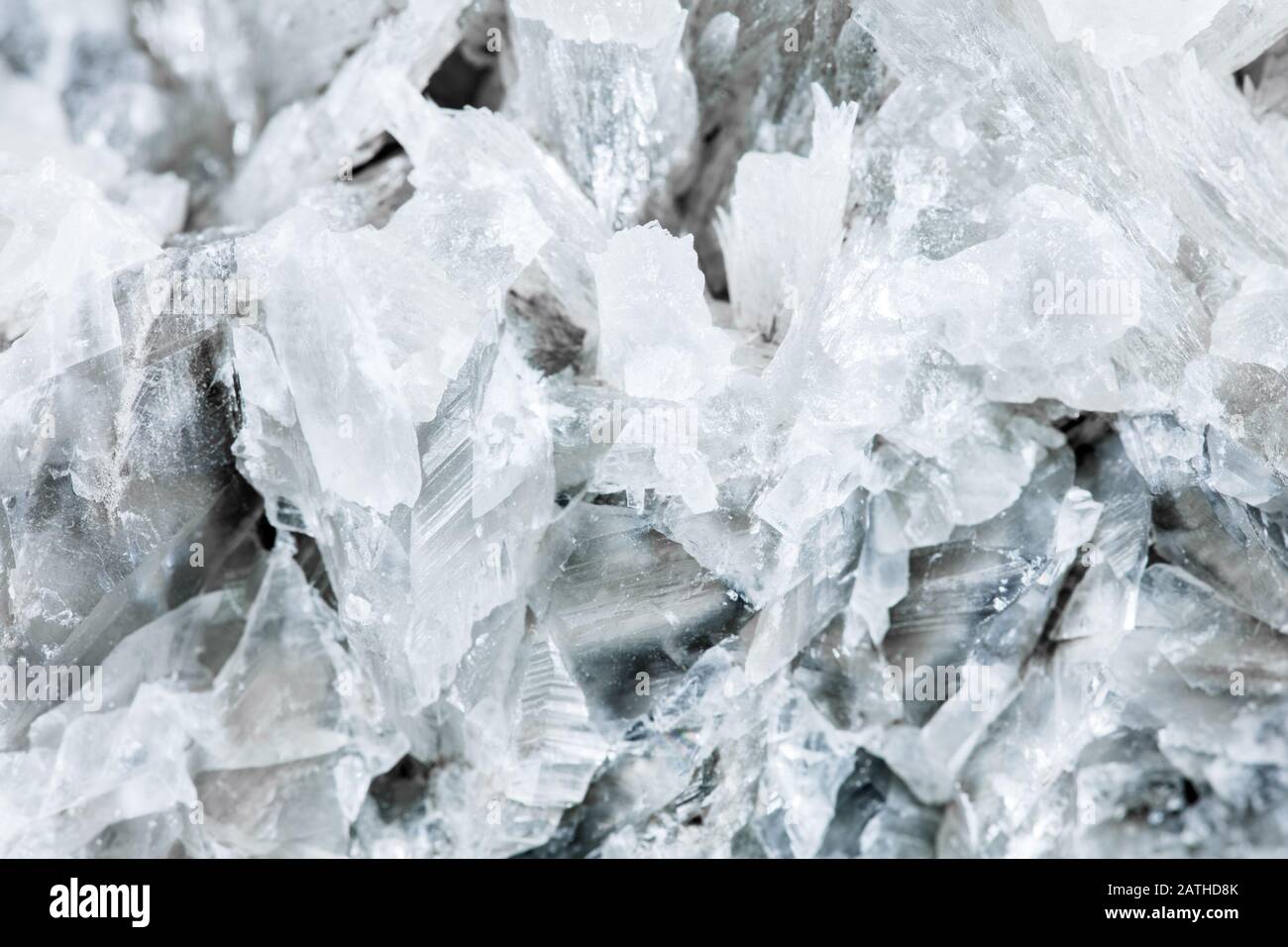Closeup of white calcite mineral stone, pattern background with details ...