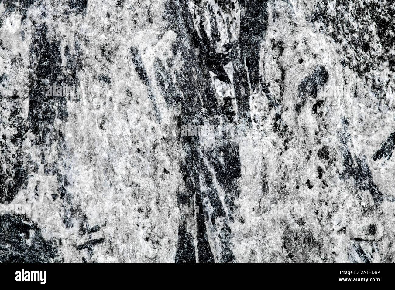 Closeup of Tourmaline or schorl minerals into matrix, pattern ...