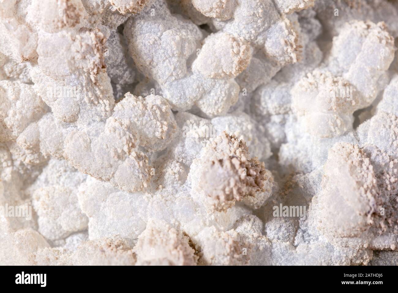Closeup of white quartz mineral stone, pattern background with details ...
