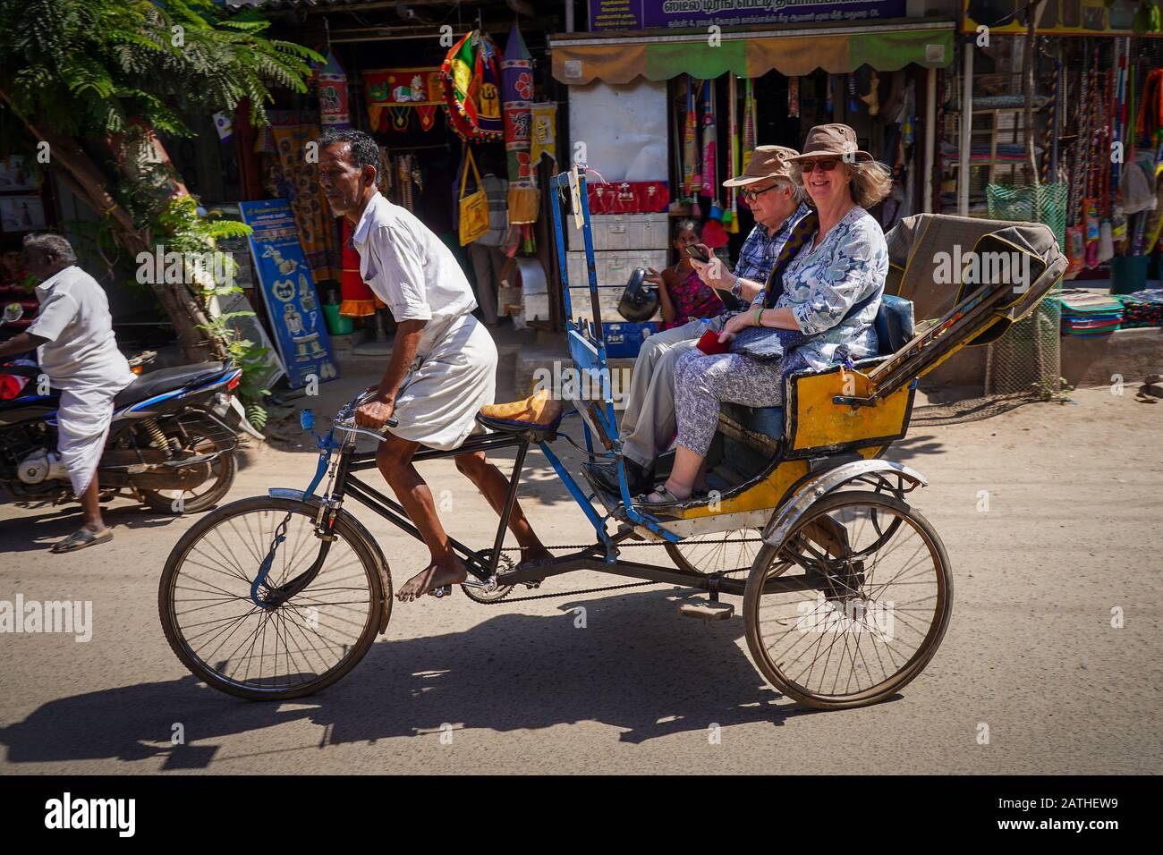 Tourists on a rickshaw in Madurai. From a series of travel photos in ...