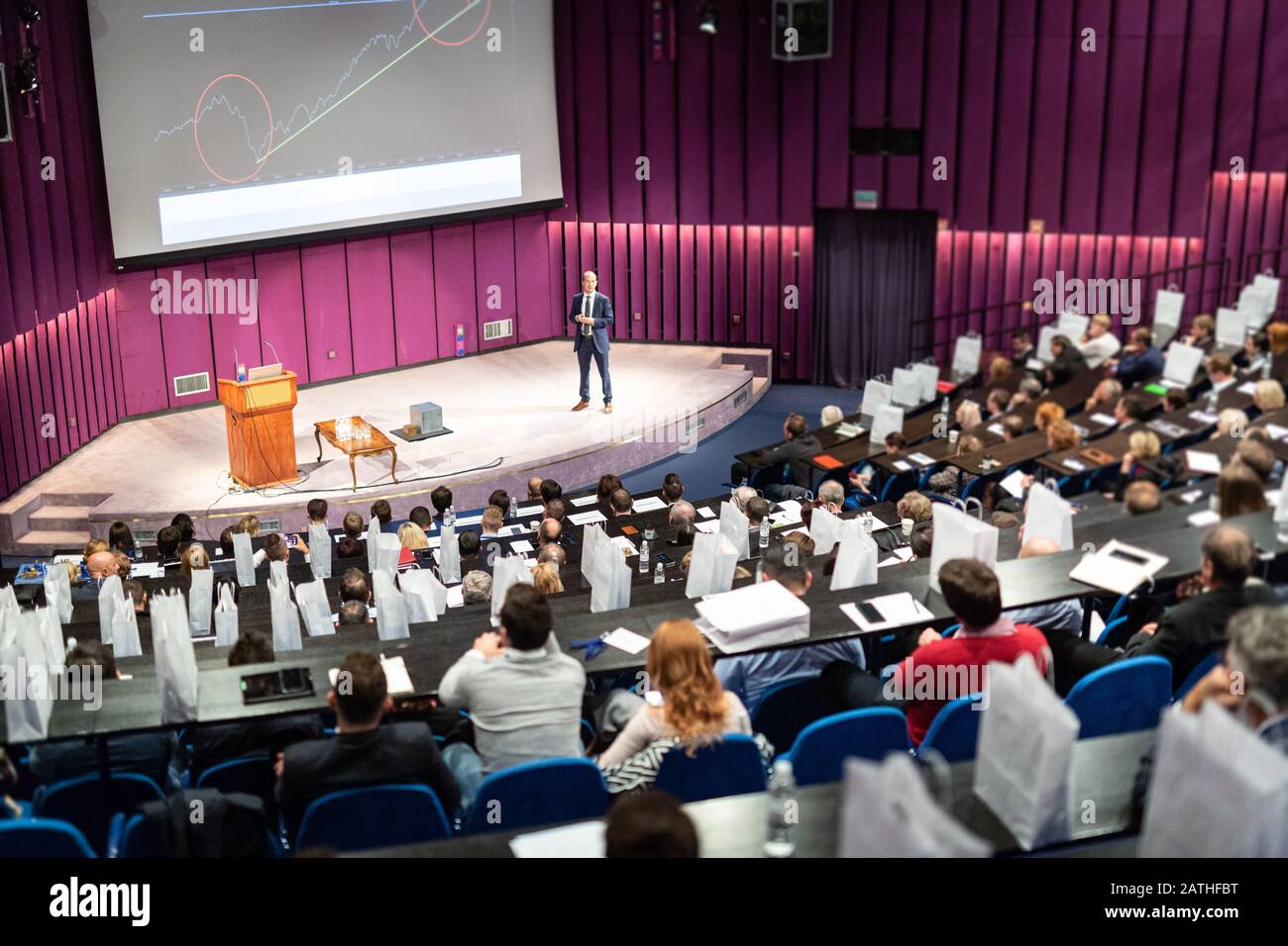 Speaker giving presentation on business conference event Stock Photo ...