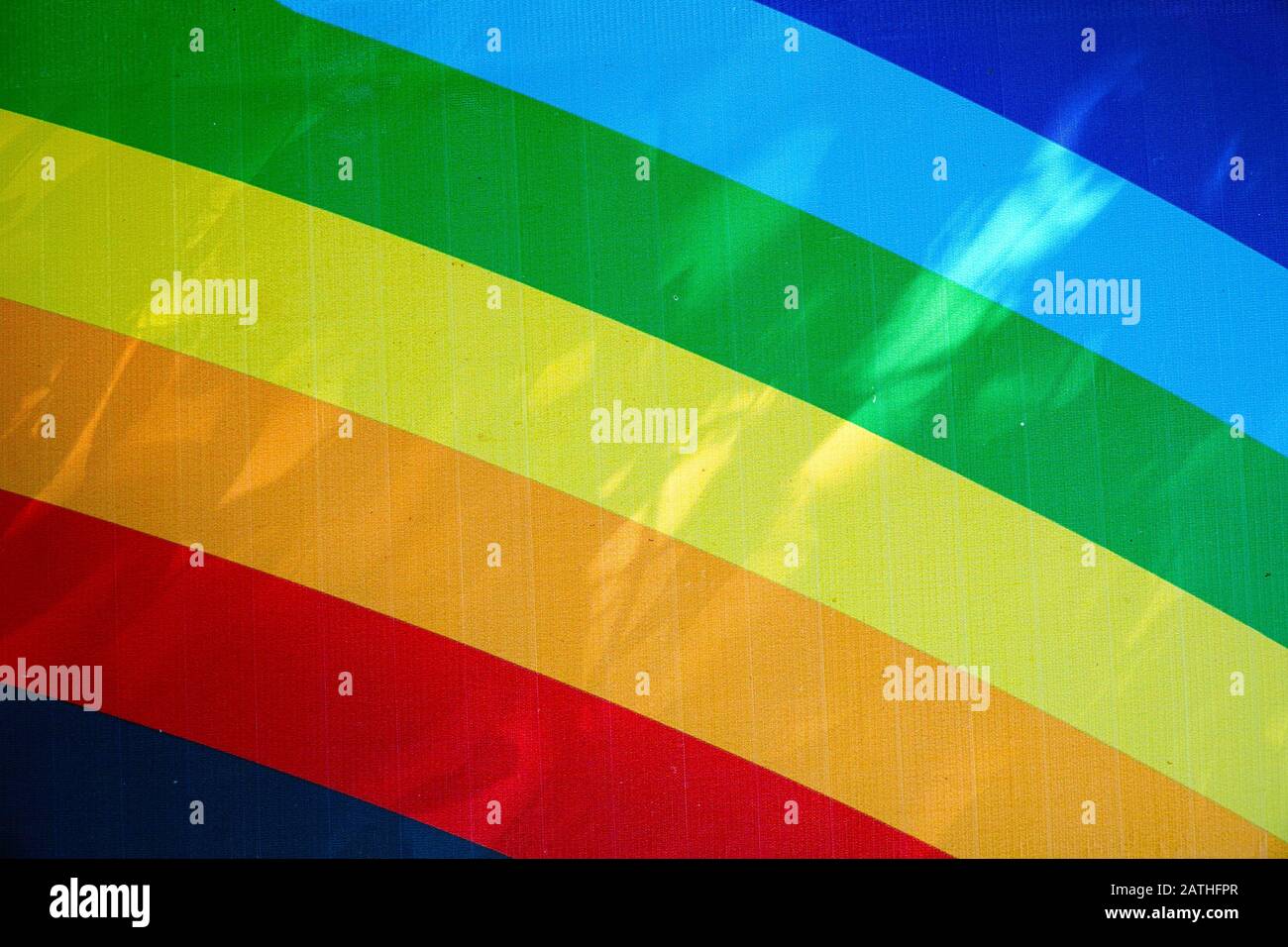 Rainbow colors background on fabric canvas for design Stock Photo - Alamy