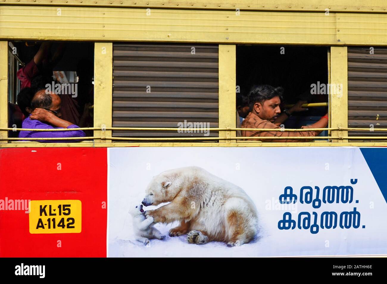 Locals on a bus. From a series of travel photos in Kerala, South India ...