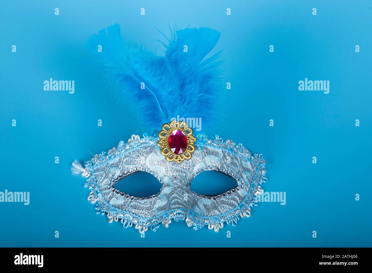 Venetian blue masks of woman on blue background. Carnival party concept ...