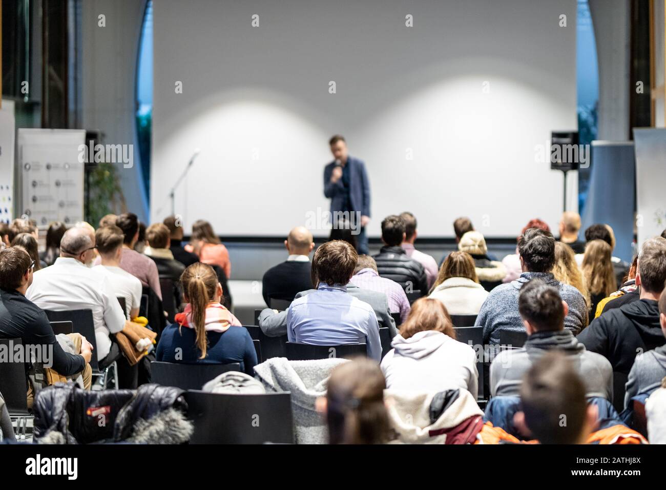 Business speaker giving a talk at business conference event Stock Photo ...