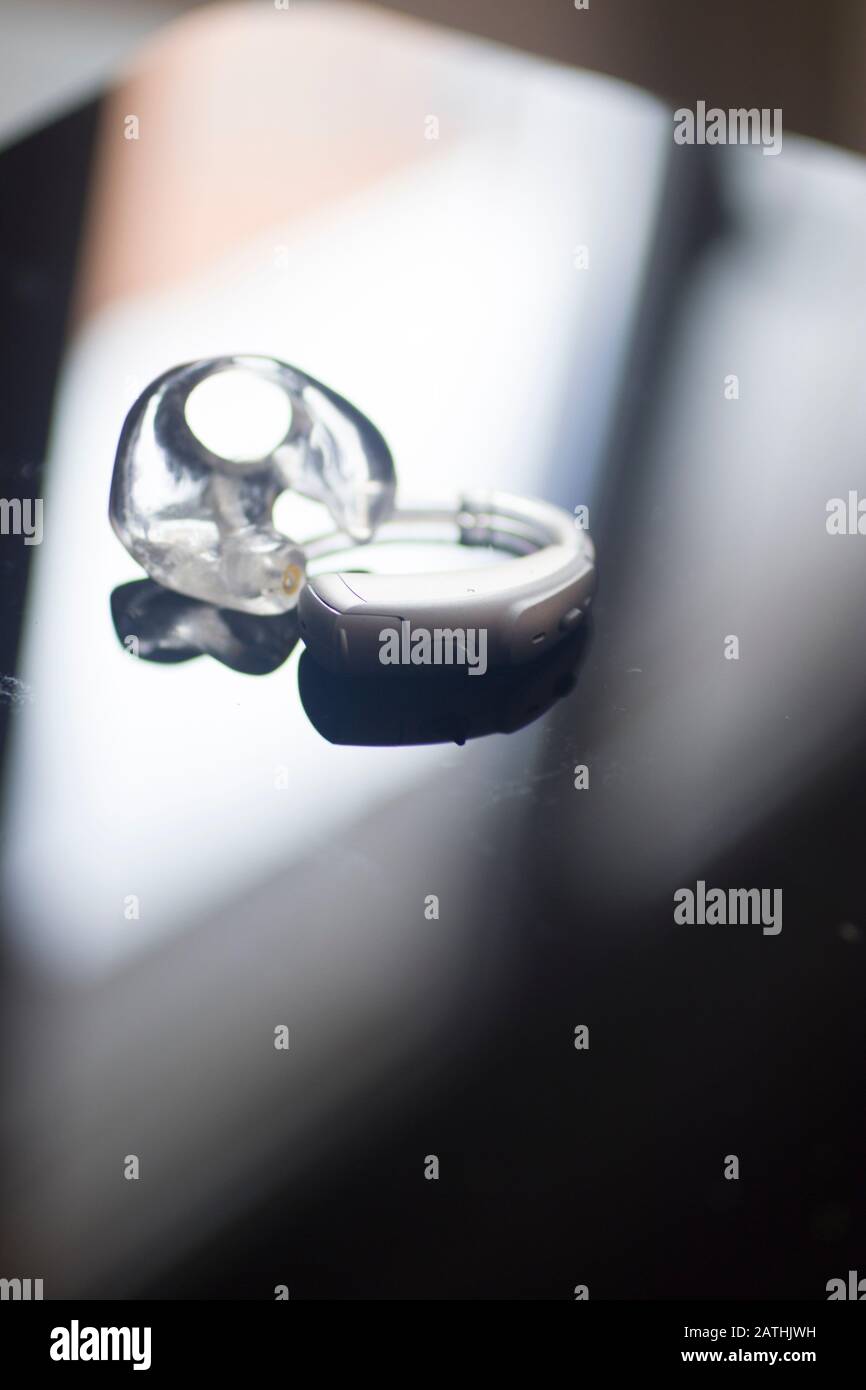 Modern digital hearing aid for deafness and deaf people Stock Photo - Alamy