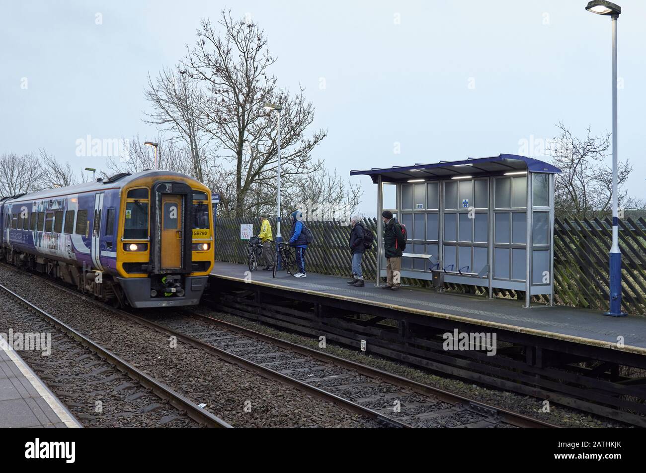 Class 158 diesel train operated by Northern Rail arriving in Giggleswick station in the ...