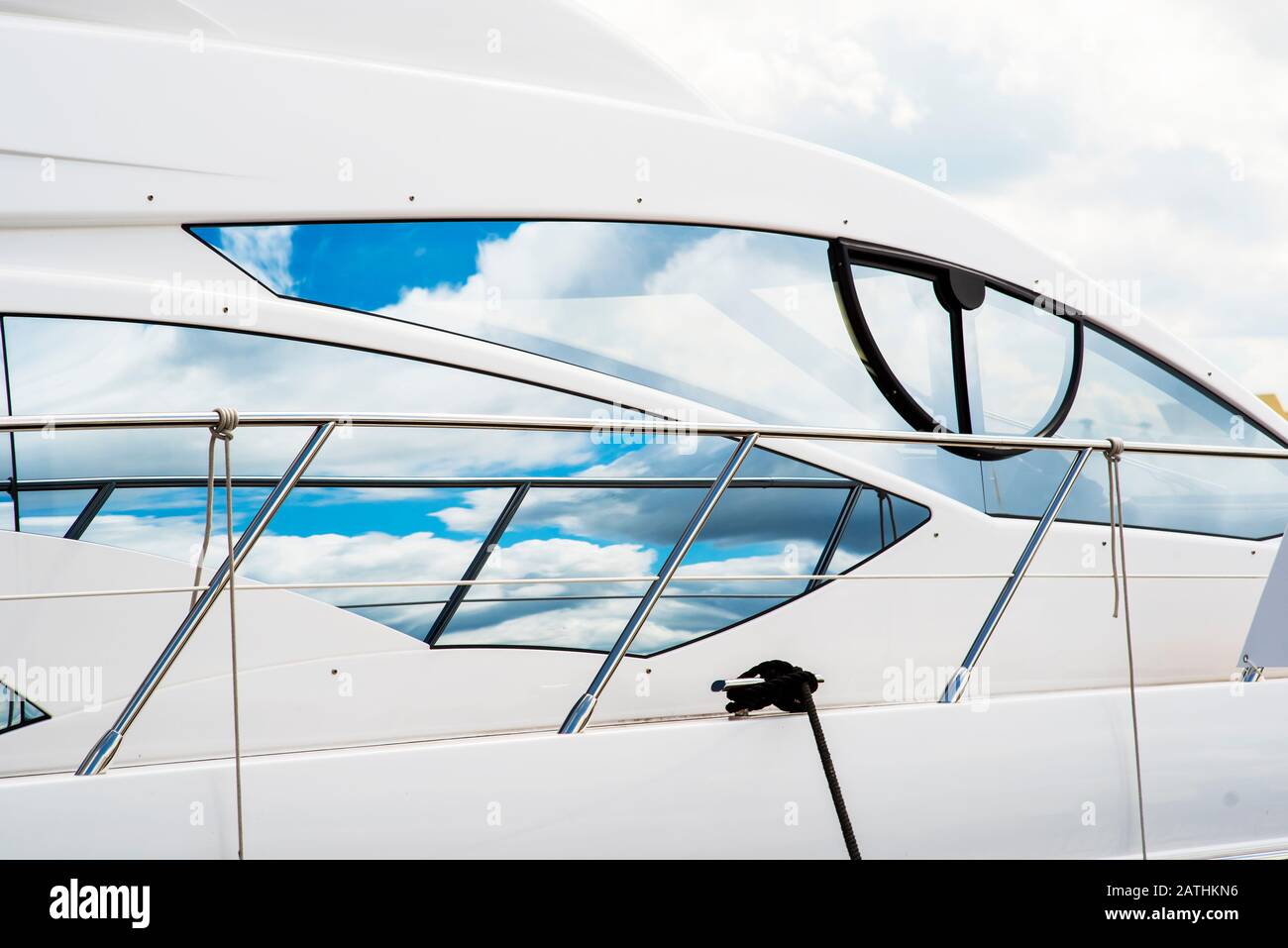 Nautical background of a row of luxury yachts, with black tinted ...