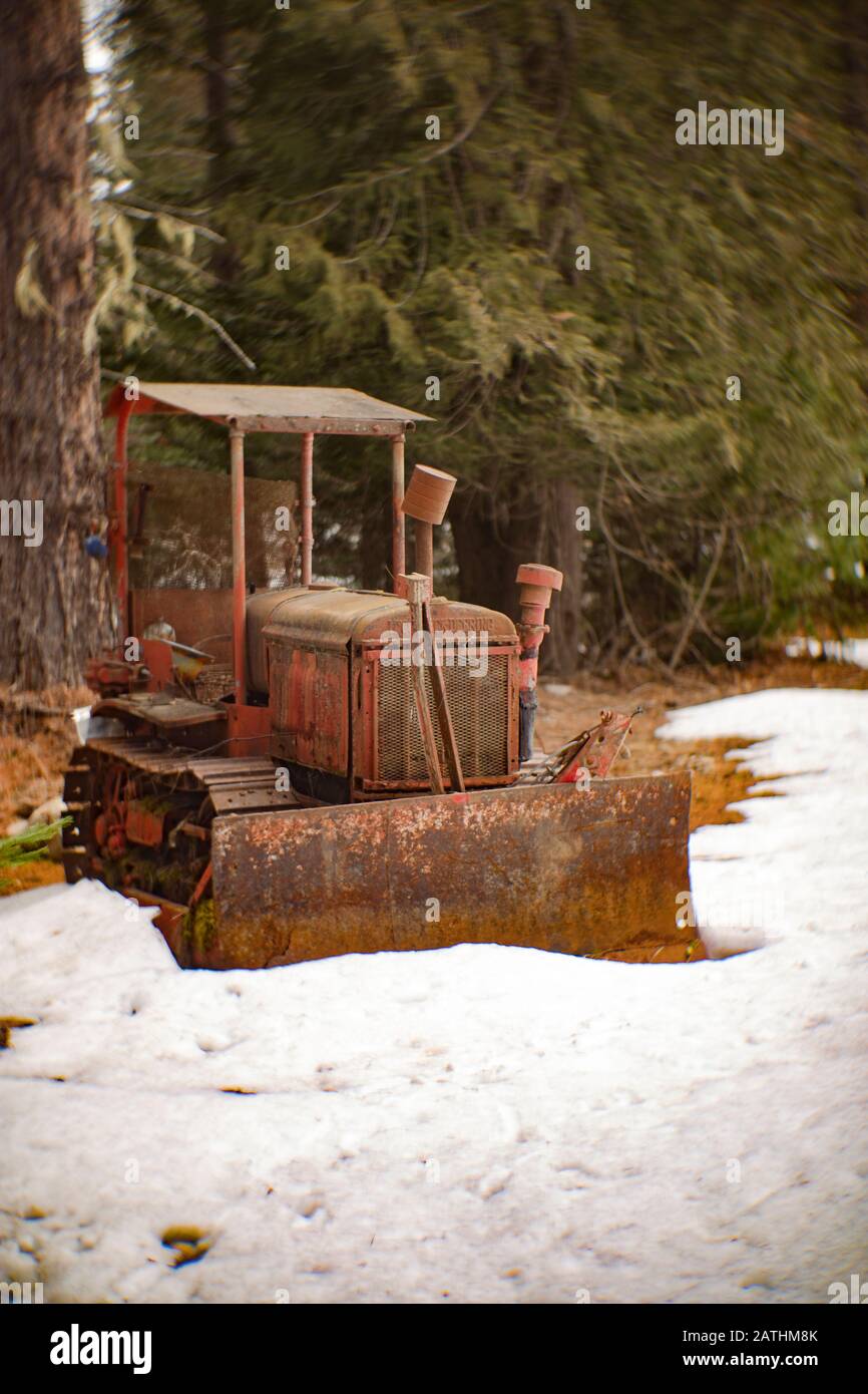 An old, red 1932 International McCormick-Deering T20 Bulldozer Crawler ...