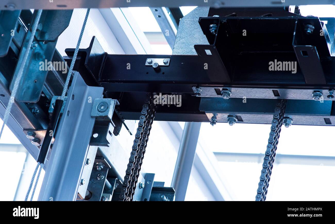 Elevator Installation, Lift Technician Installing a Modern Elevator ...