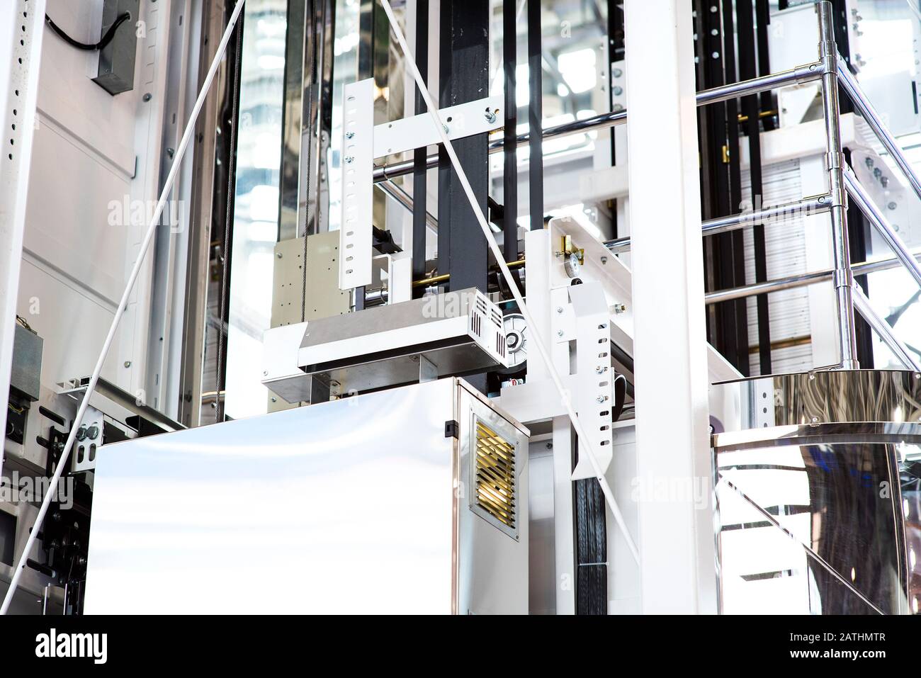 Elevator Installation, Lift Technician Installing a Modern Elevator ...