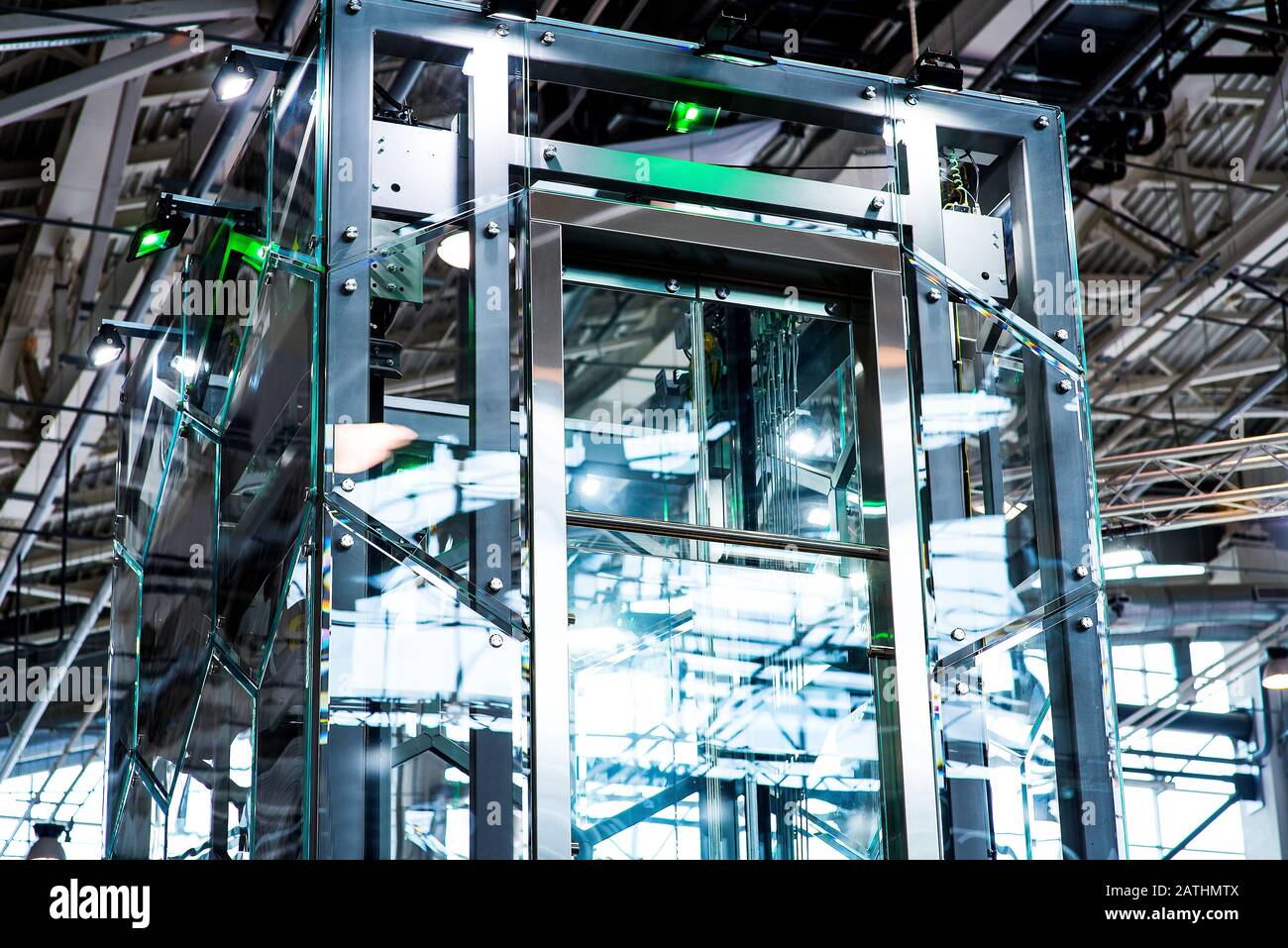 Elevator Installation, Lift Technician Installing a Modern Elevator ...
