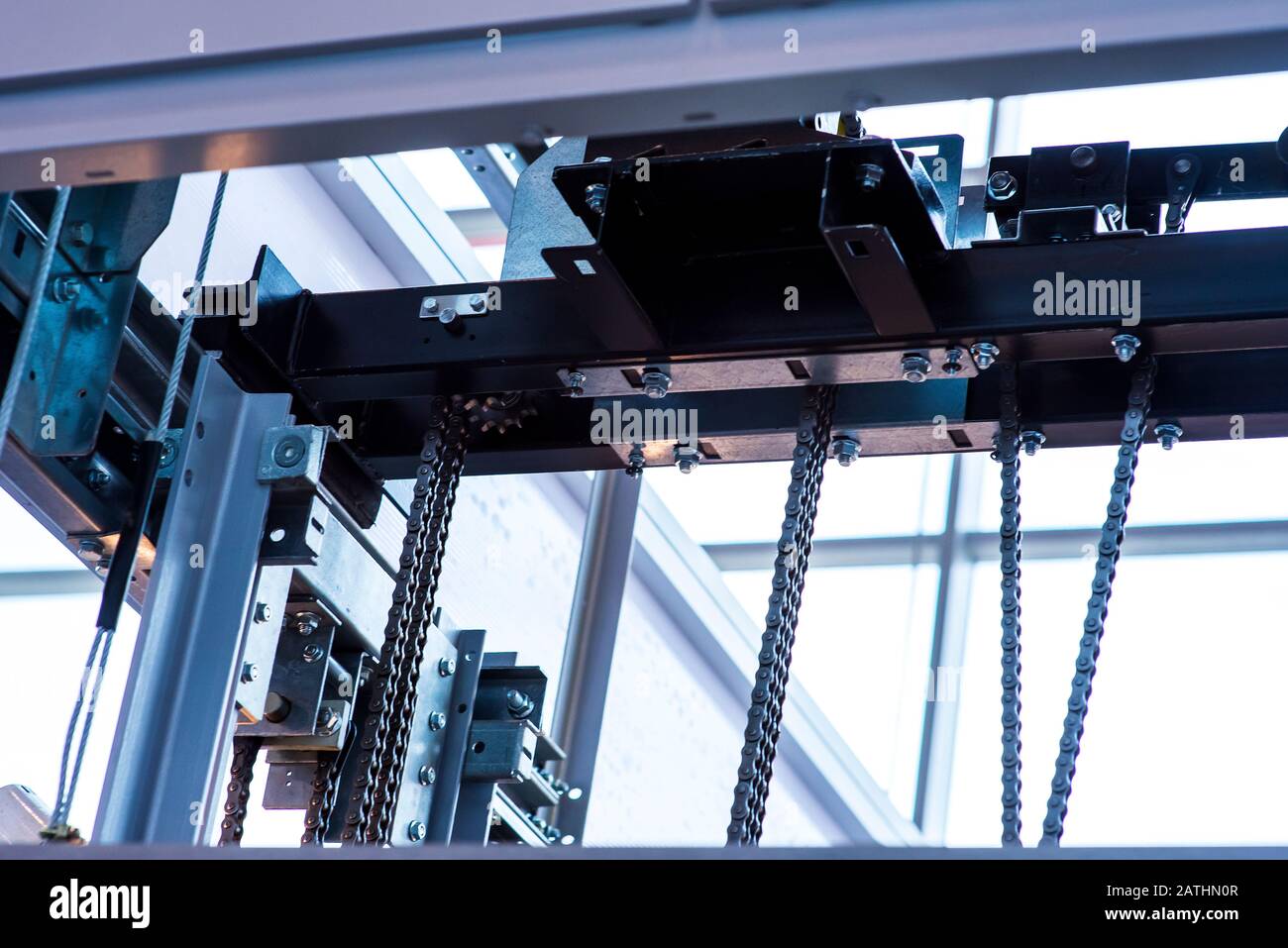 Glass elevator ,Businessman taking modern glass elevator to the upper ...